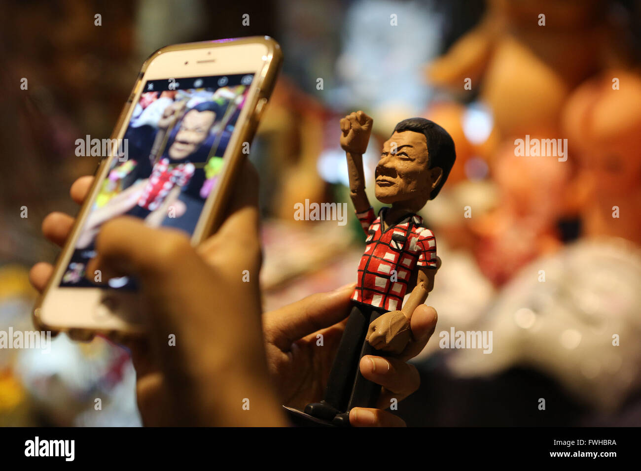 Pasay City, Philippines. 12th June, 2016. A visitor takes a picture of ...