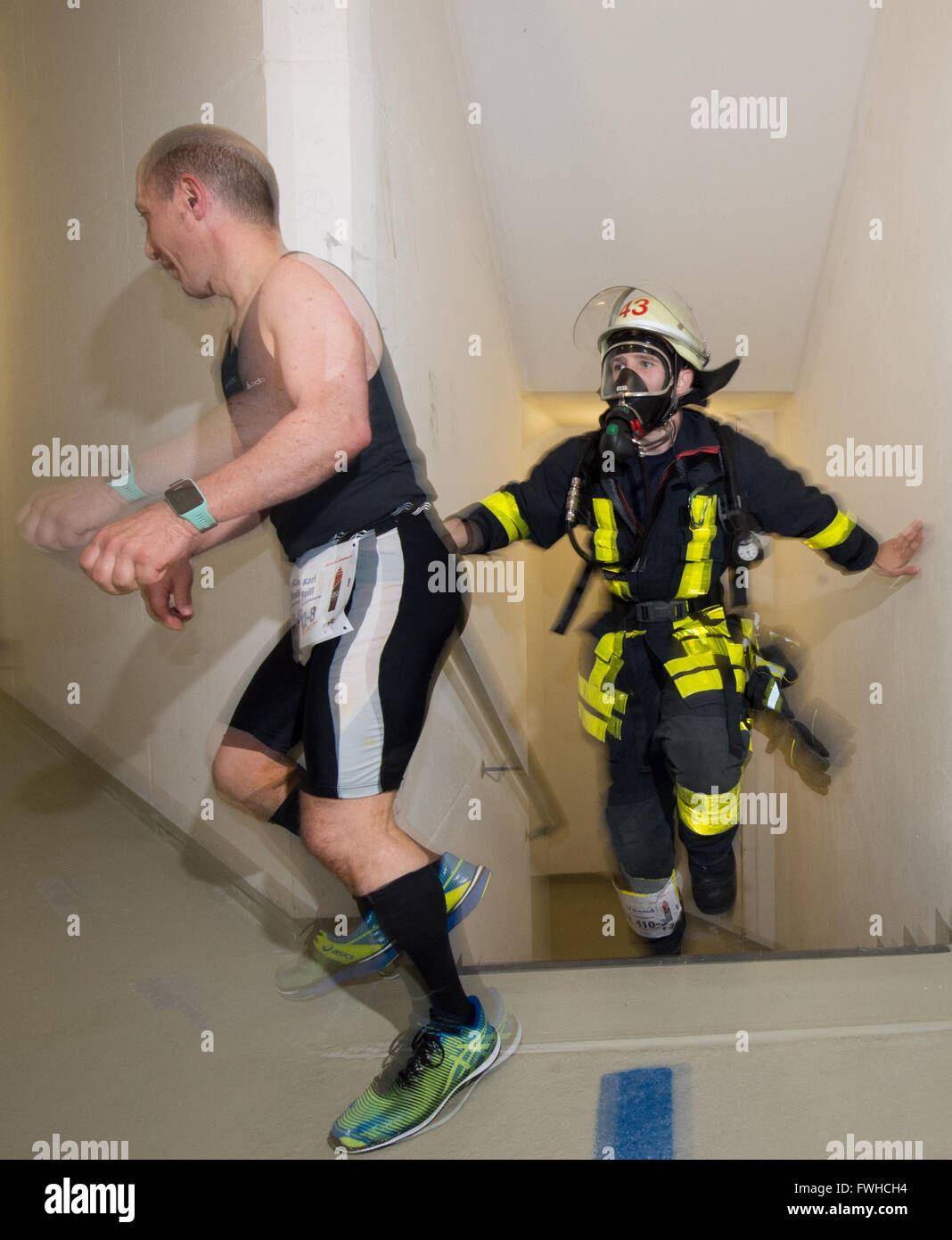 A firefighter wearing full gear encounters a participant of the ...