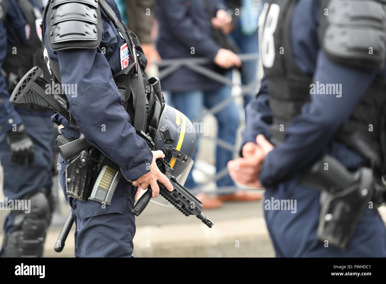 French police officers carry rifles outside the stadium before the UEFA ...