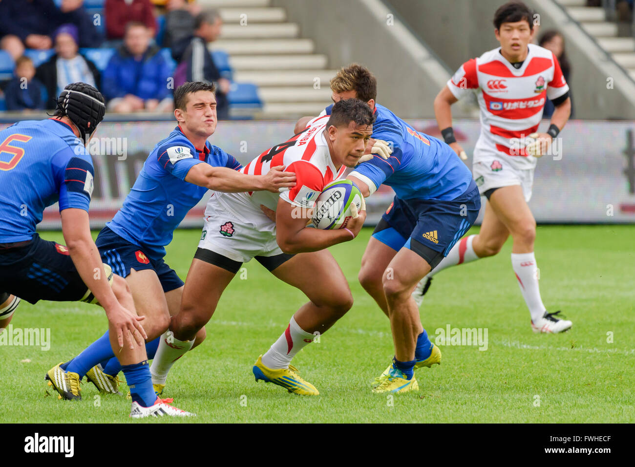 Manchester, UK. 11th June, 2016. Ataata Moeakiola (middle) of Japan U20 ...