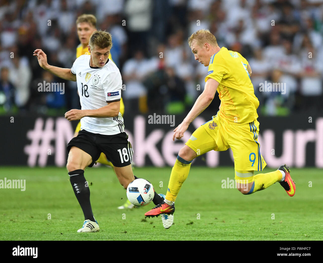 Lille, France, 12th June, 2016. Toni Kroos (L) of Germany and Viktor ...