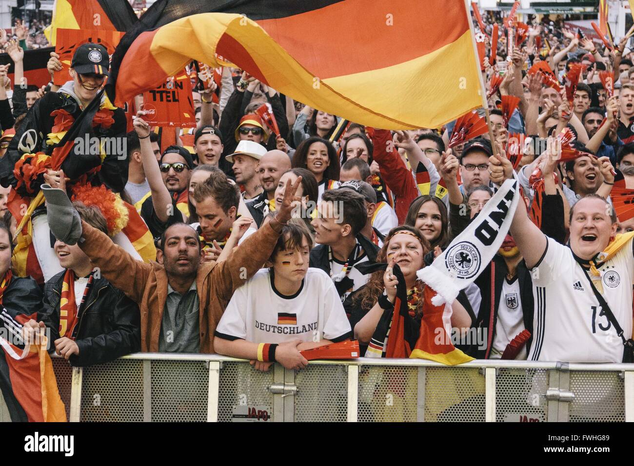 Berlin, Germany. 12th June, 2016. German football fans cheer as they ...