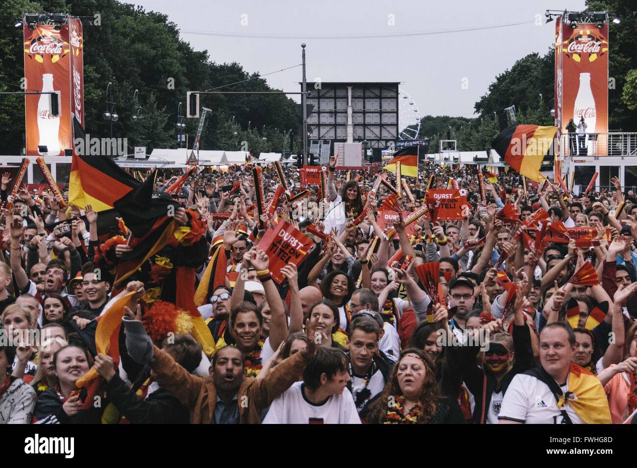 Berlin, Germany. 12th June, 2016. German football fans cheer as they ...