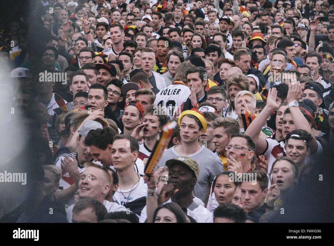 Berlin, Germany. 12th June, 2016. German football fans cheer as they ...