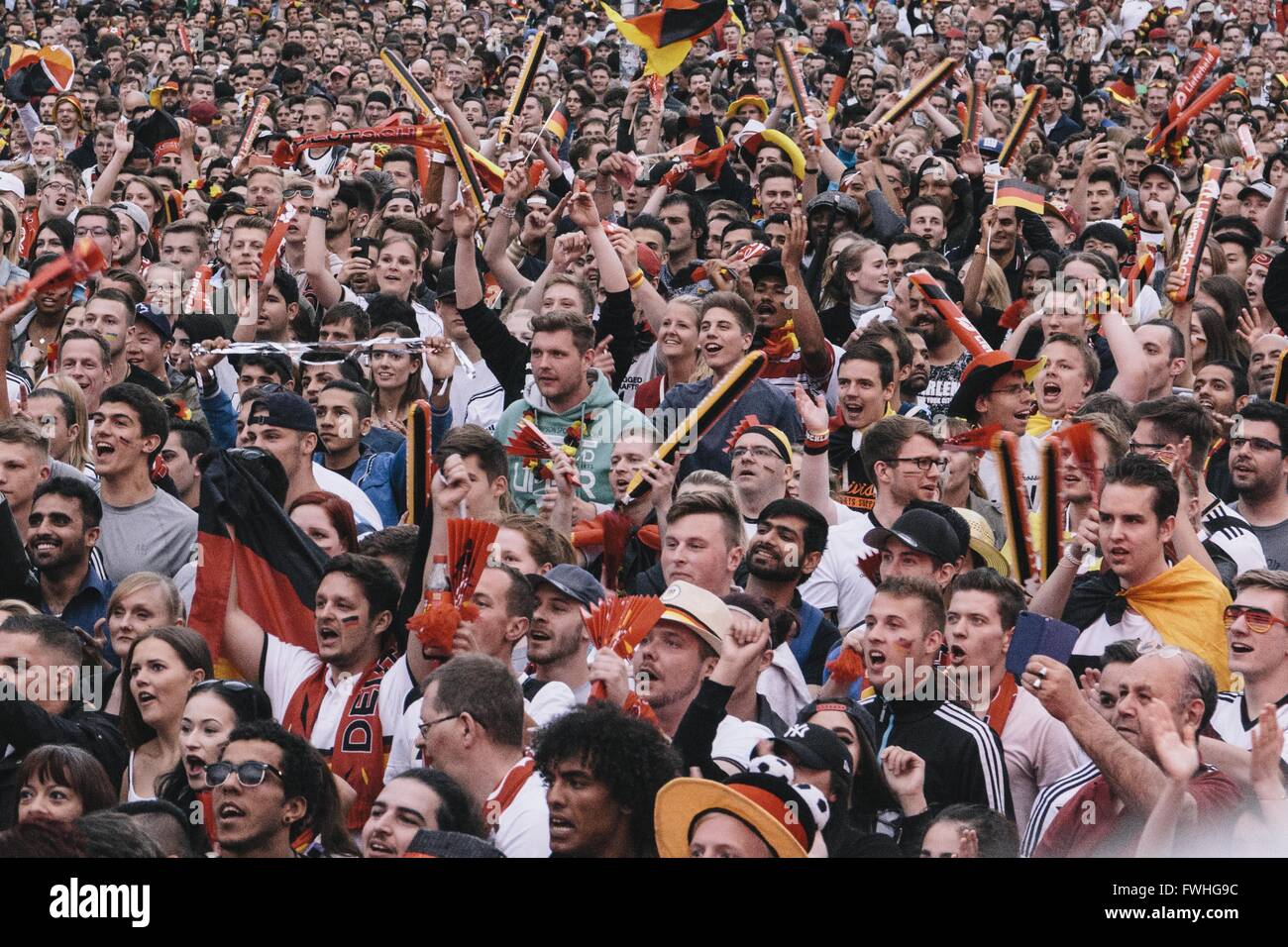 Berlin, Germany. 12th June, 2016. German football fans cheer as they ...