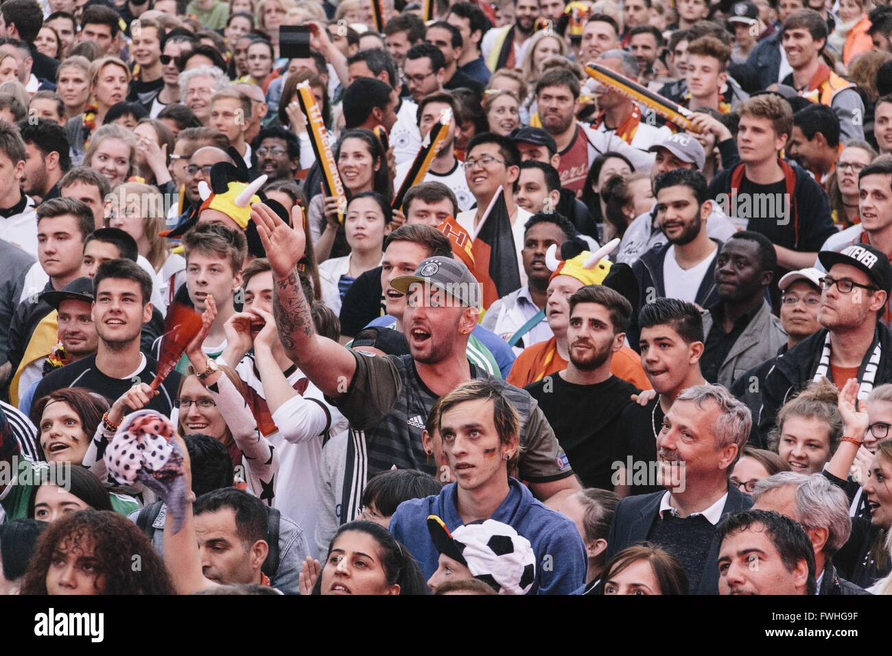 Berlin, Germany. 12th June, 2016. German football fans cheer as they ...
