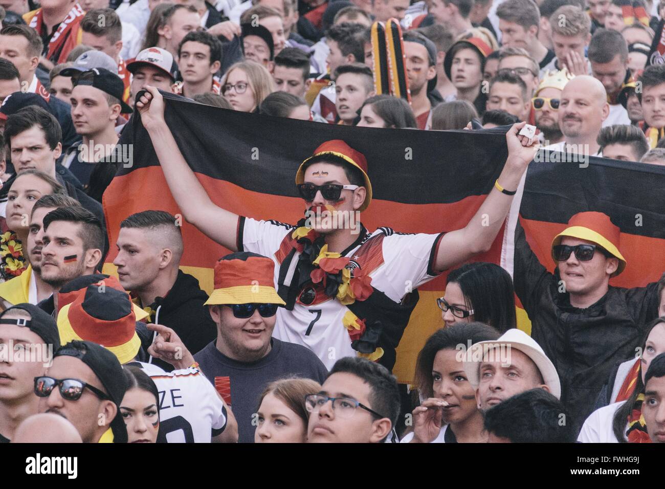 Berlin, Germany. 12th June, 2016. German football fans cheer as they ...