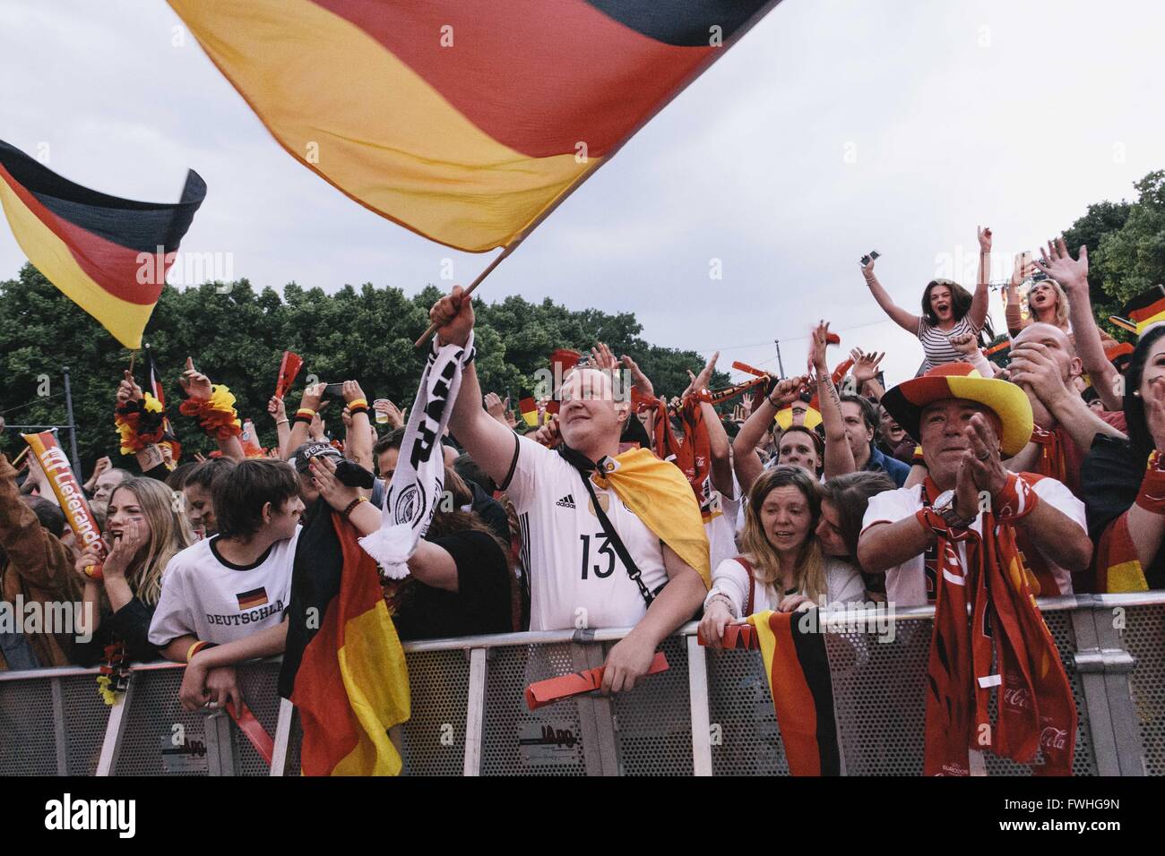 Berlin, Germany. 12th June, 2016. German football fans cheer as they ...