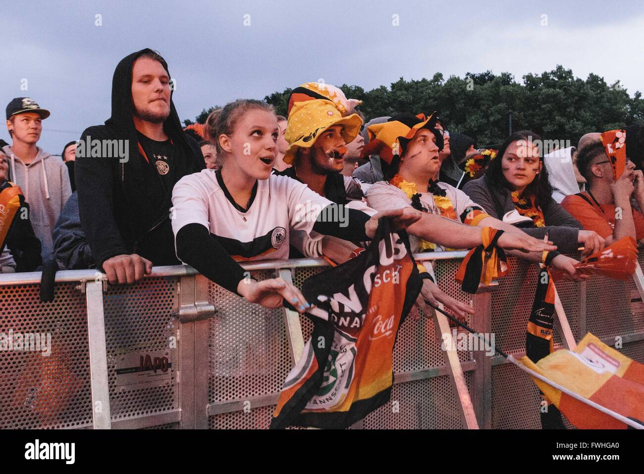 Berlin, Germany. 12th June, 2016. German football fans cheer as they ...