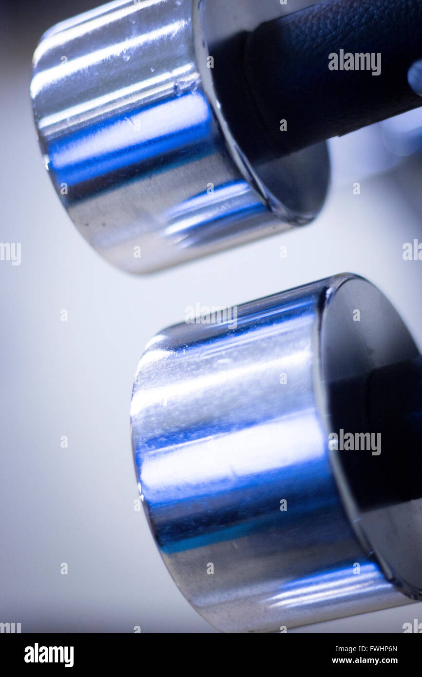 Chromed metal dumbells in crossfit, bodybuilding and weight training ...