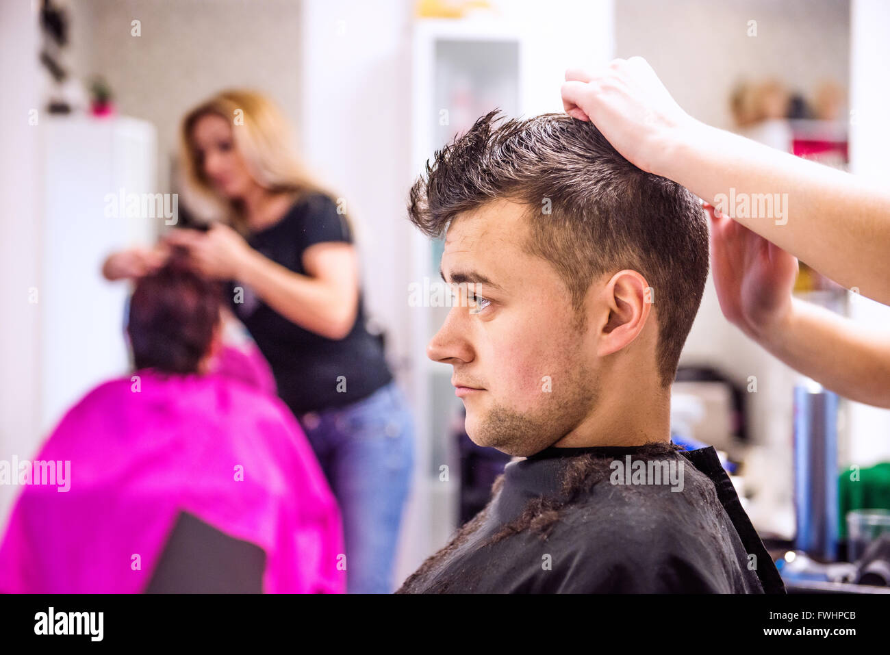 New haircut man hi-res stock photography and images - Alamy