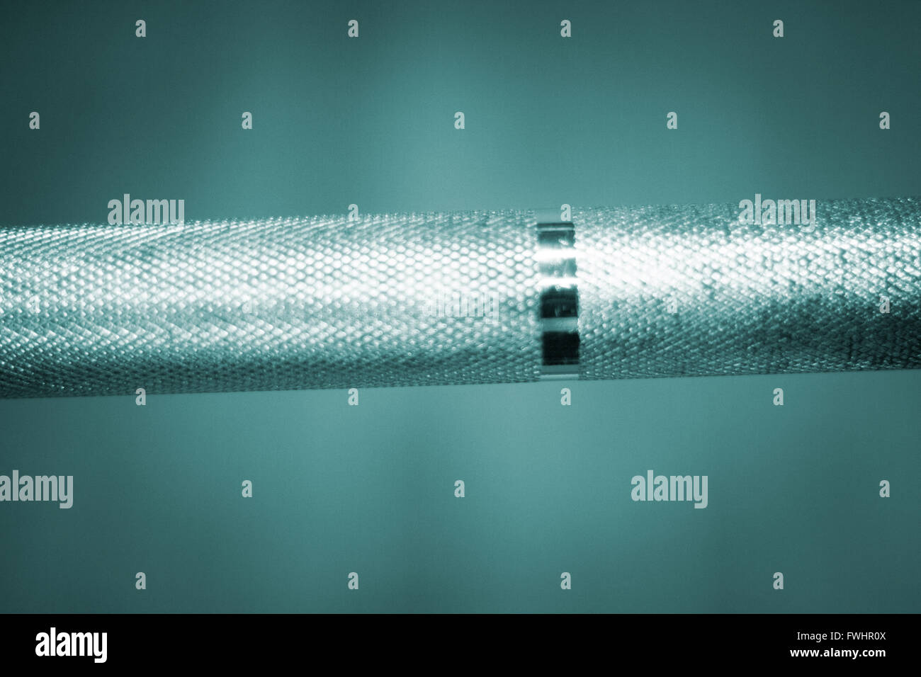 Olympic metal barbell in crossfit, bodybuilding and weight training ...