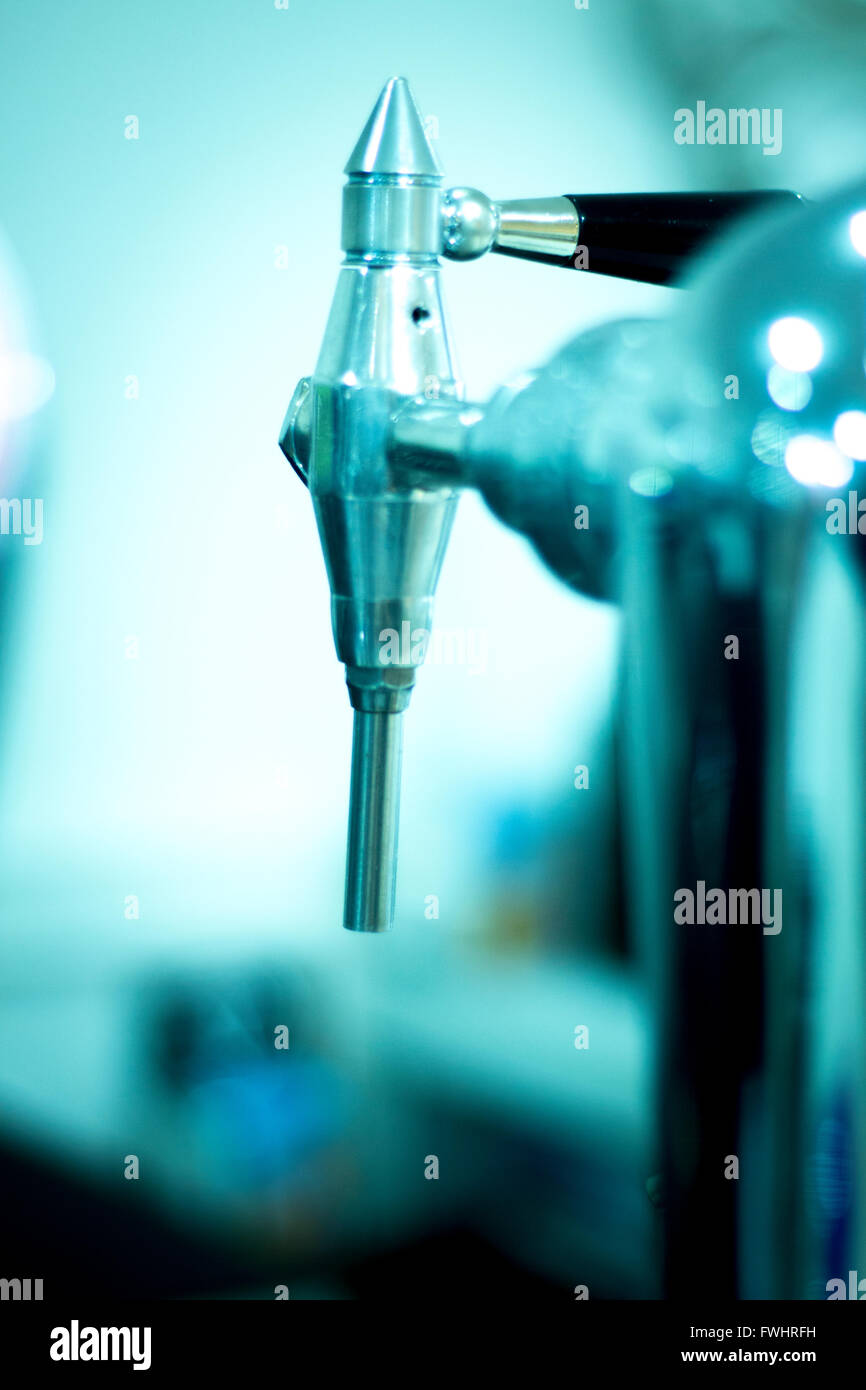 Draught beer pump tap in pub bar photo Stock Photo - Alamy