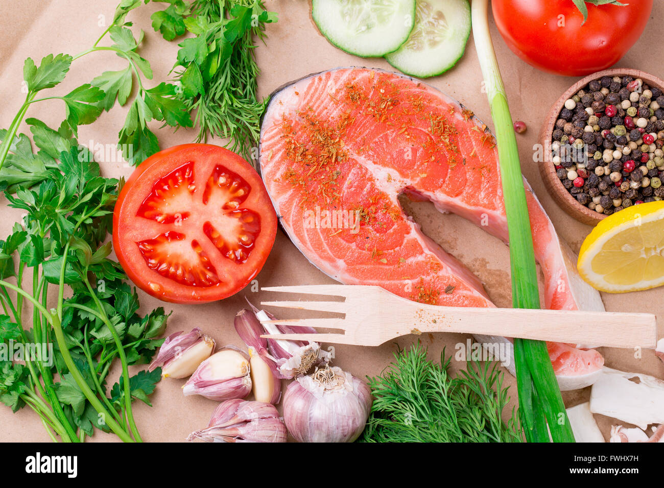 red fish steak with vegetables and spices Stock Photo - Alamy