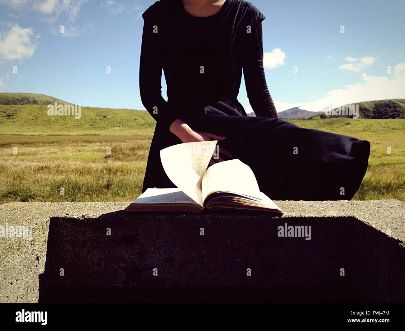 Woman turning page book hi-res stock photography and images - Alamy