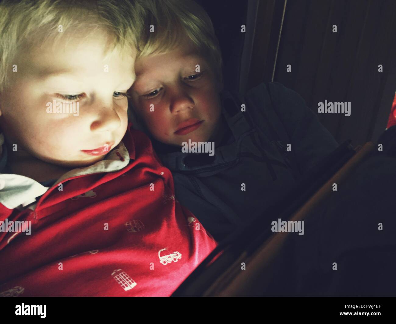 Two boys looking at hi-res stock photography and images - Alamy