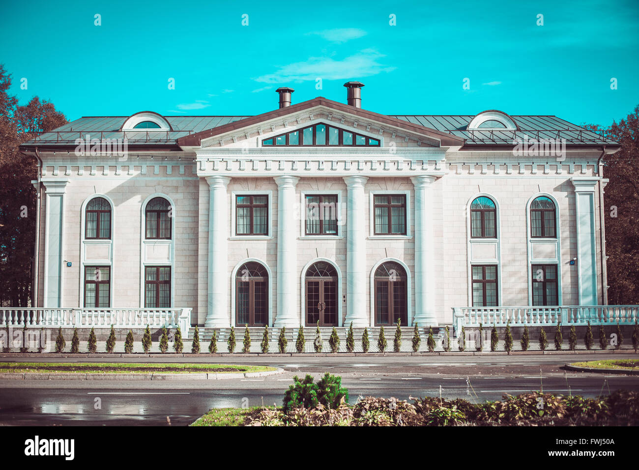 two level park house under the blue sky Stock Photo - Alamy