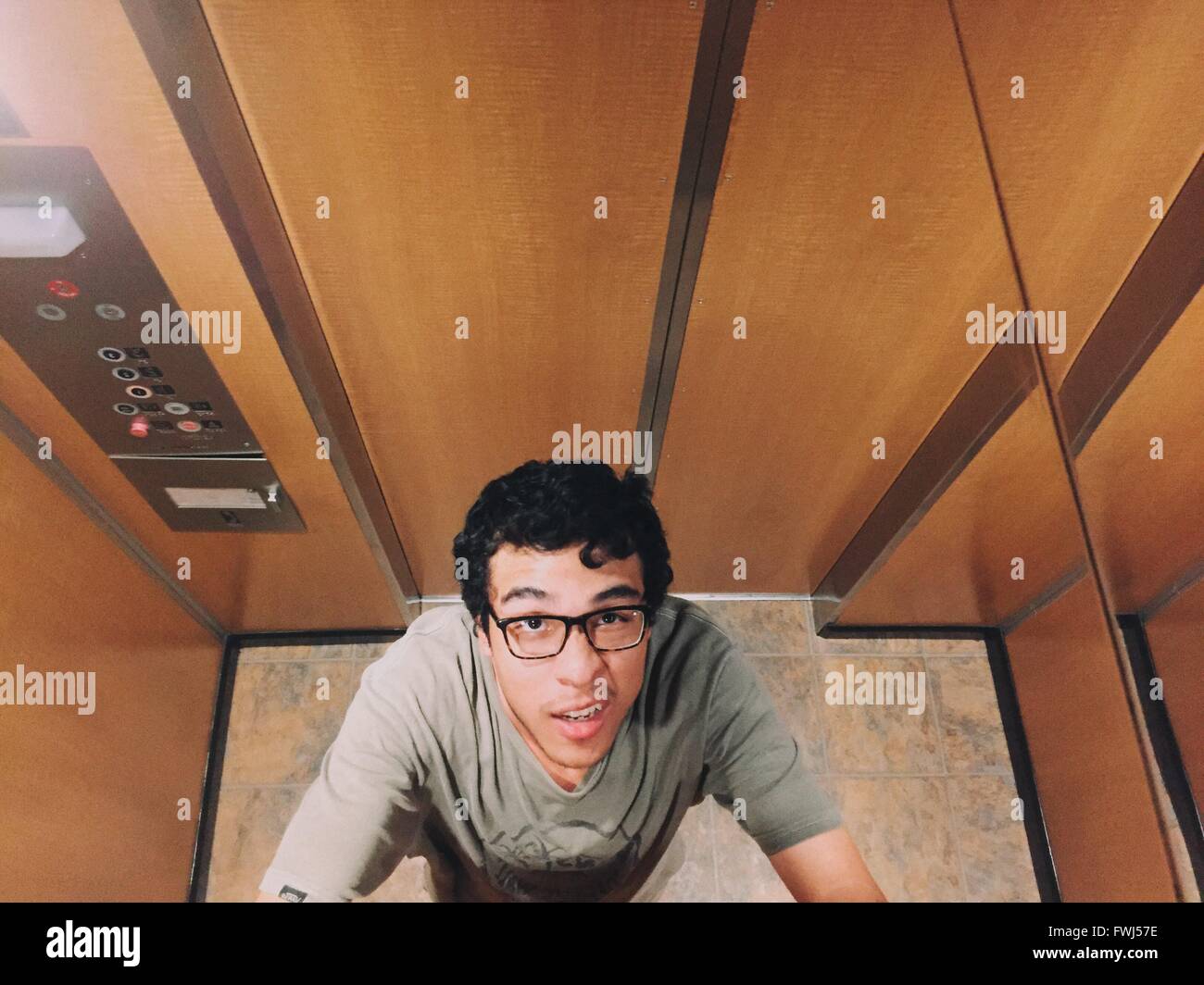 Man in elevator hi-res stock photography and images - Alamy