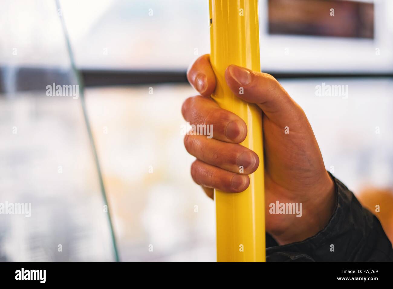 Close up hand holding pole hi-res stock photography and images - Alamy
