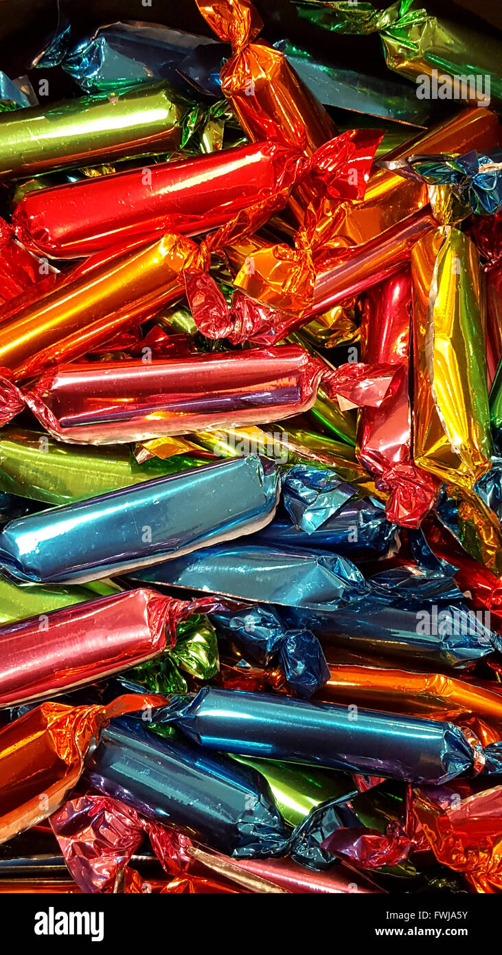 Wrapped candies hi-res stock photography and images - Alamy
