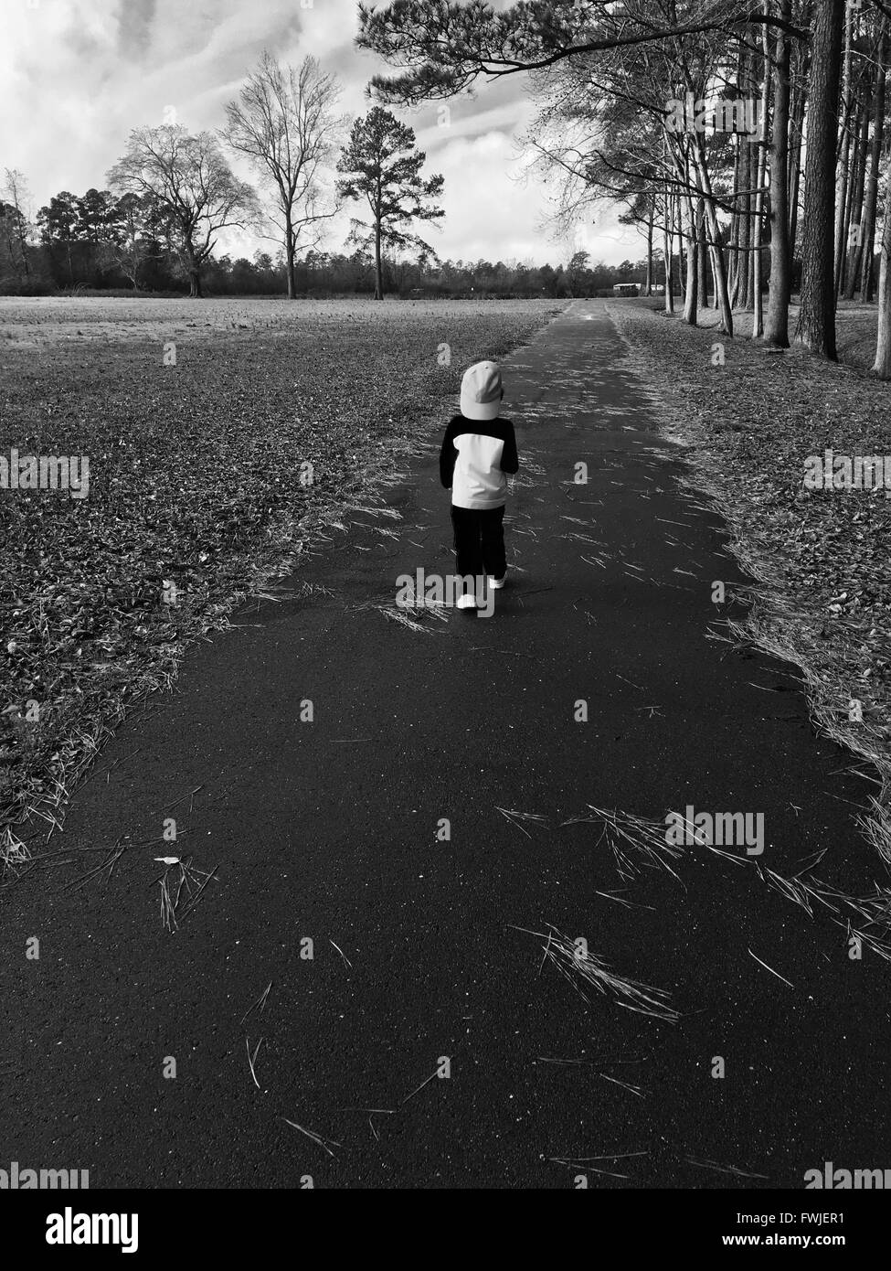 Child rear view walking road hi-res stock photography and images - Alamy