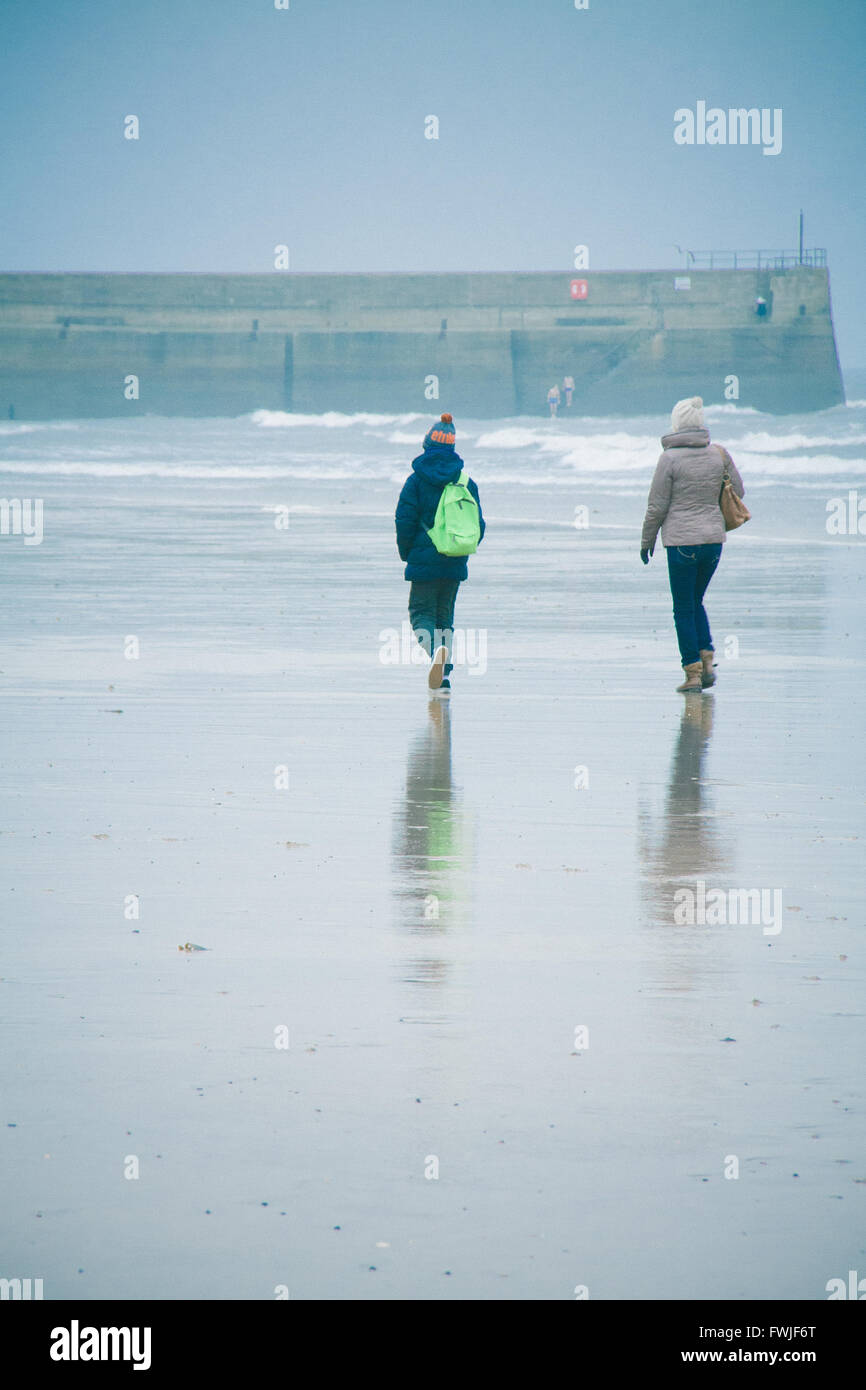 Rear View Of People Walking At Beach Stock Photo - Alamy