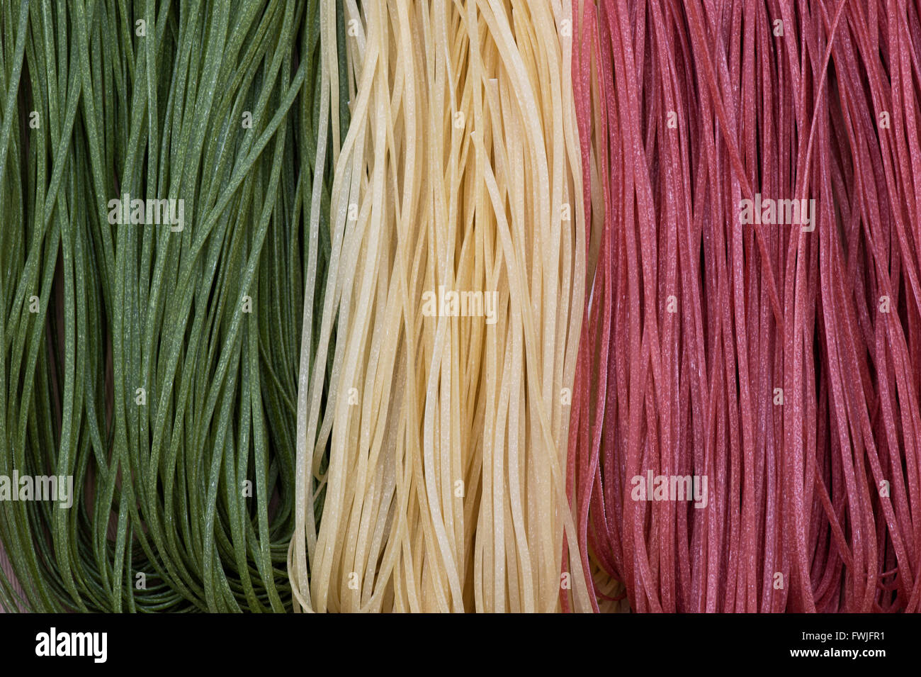 Linguine pasta in 3 flavours. The colours represent the Italian flag ...