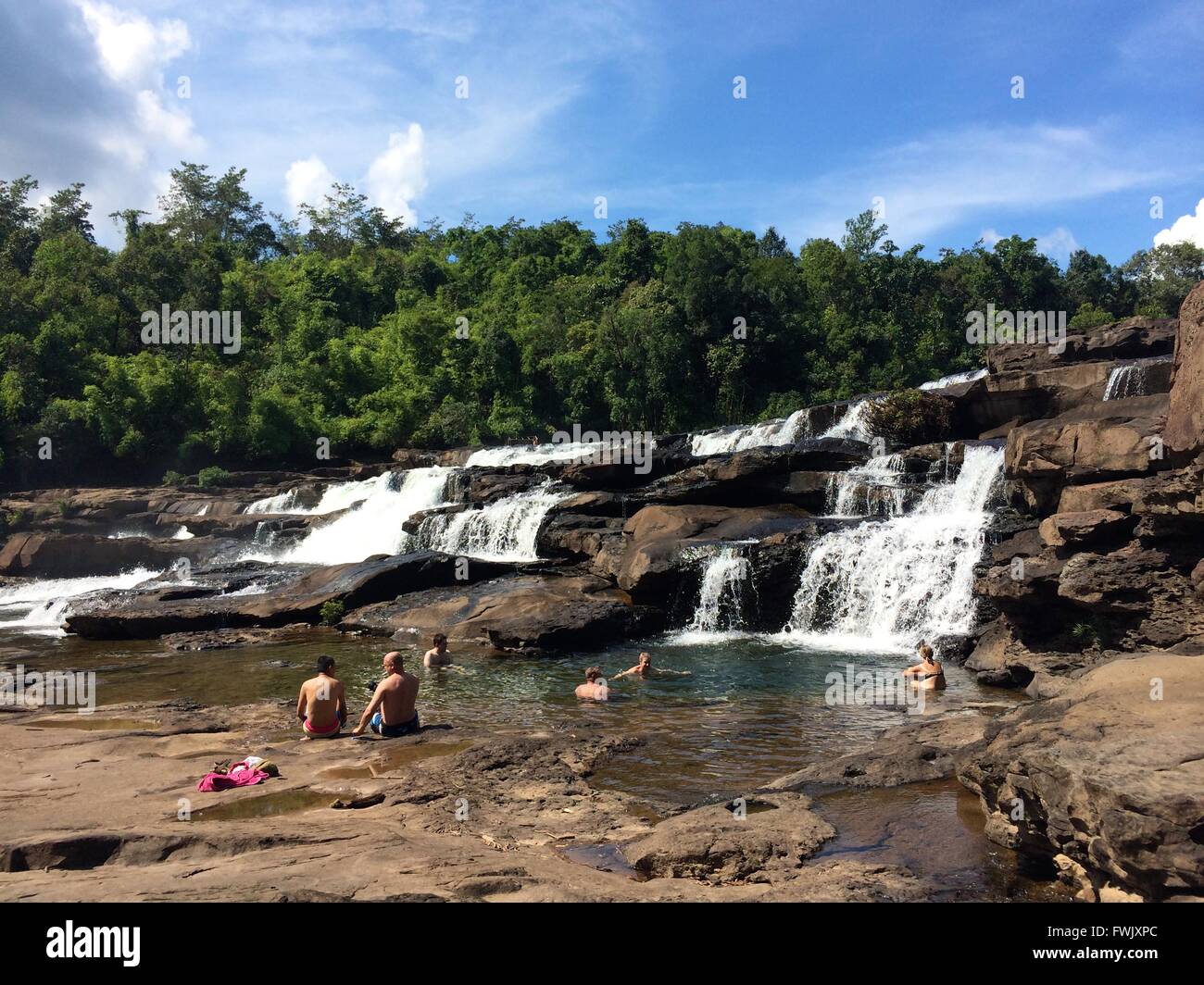 Swimmers in the pools of the Tatai Waterfall, Koh Kong, Cambodia Stock ...