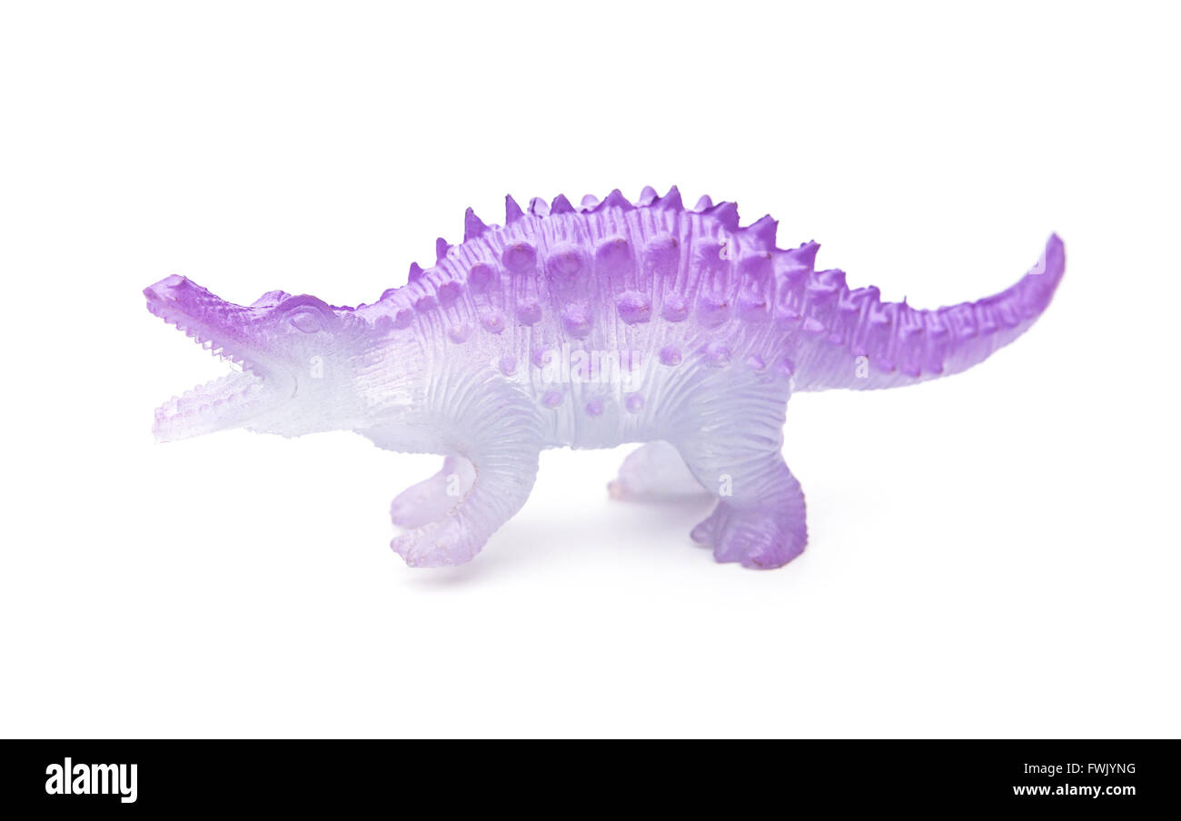 side view purple plastic dinosaur toy on a white background Stock Photo ...