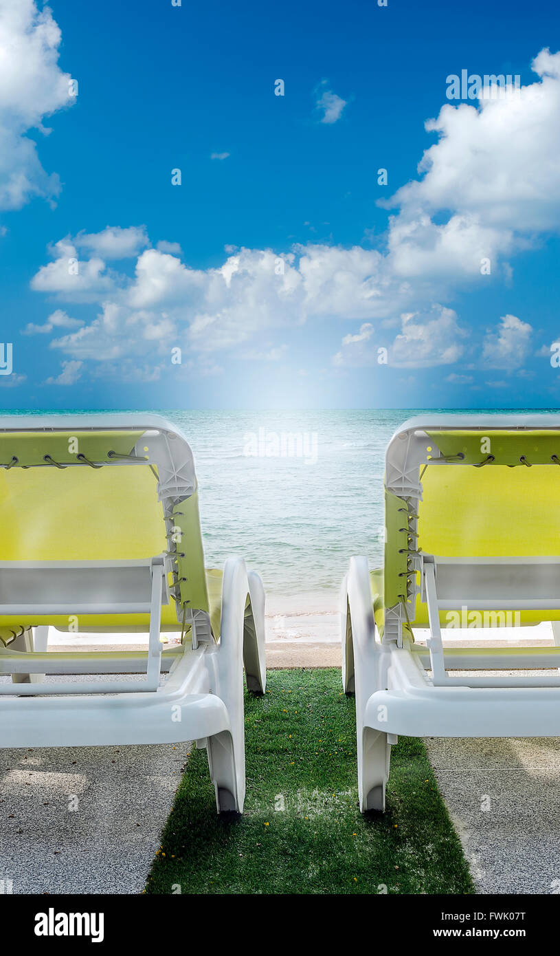 Two beach chairs on the beach hi-res stock photography and images - Alamy