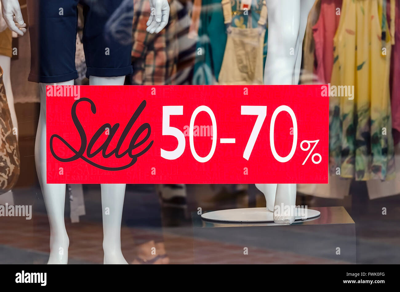 window display with red sale sign Stock Photo - Alamy