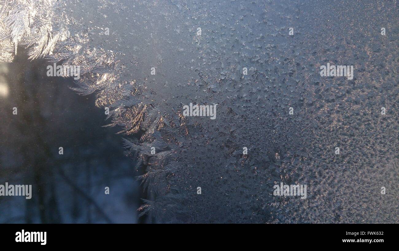 Close-Up Of Frost On Window Glass Stock Photo - Alamy