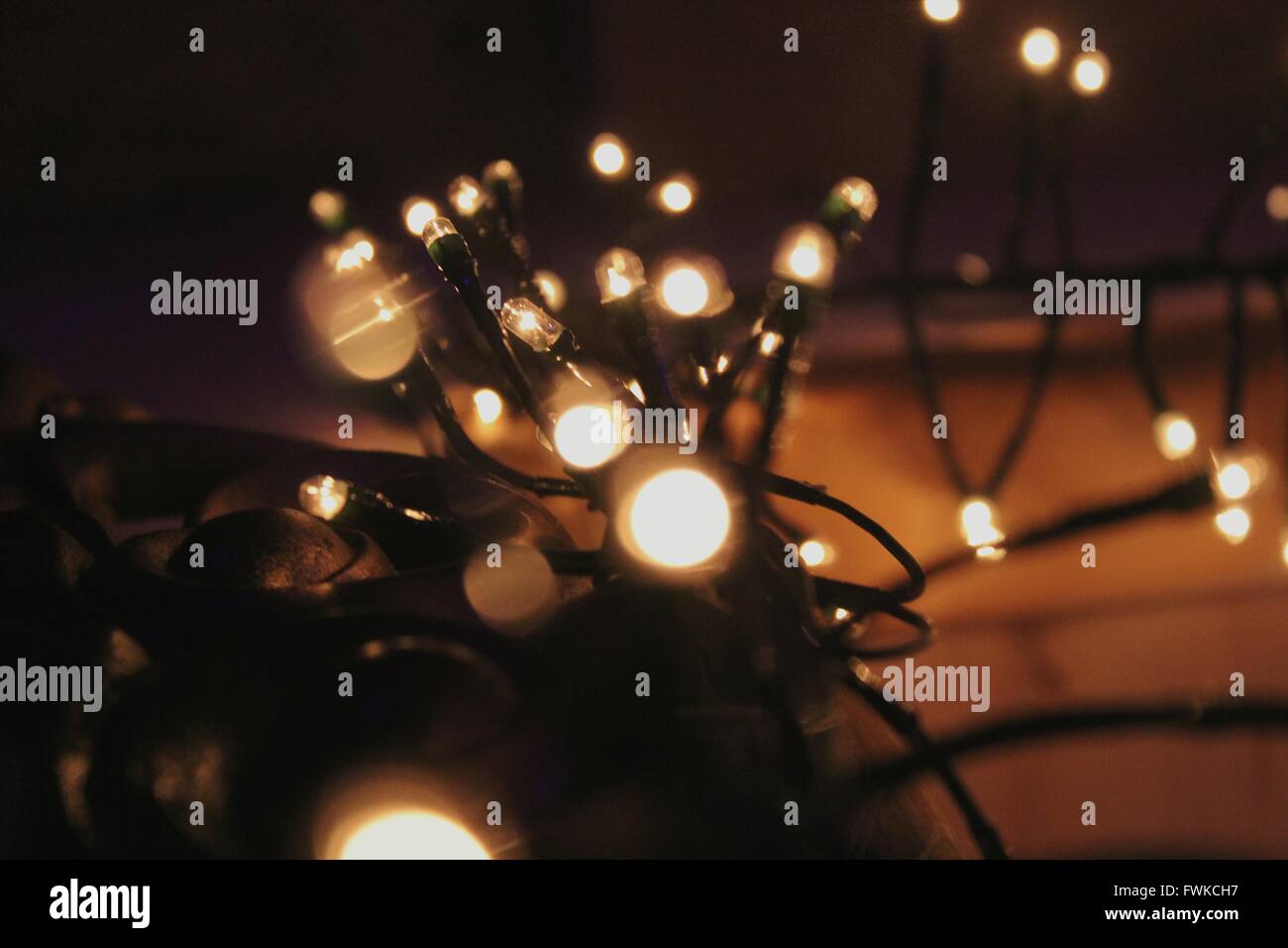 Close-Up Of Illuminated String Lights At Night Stock Photo - Alamy