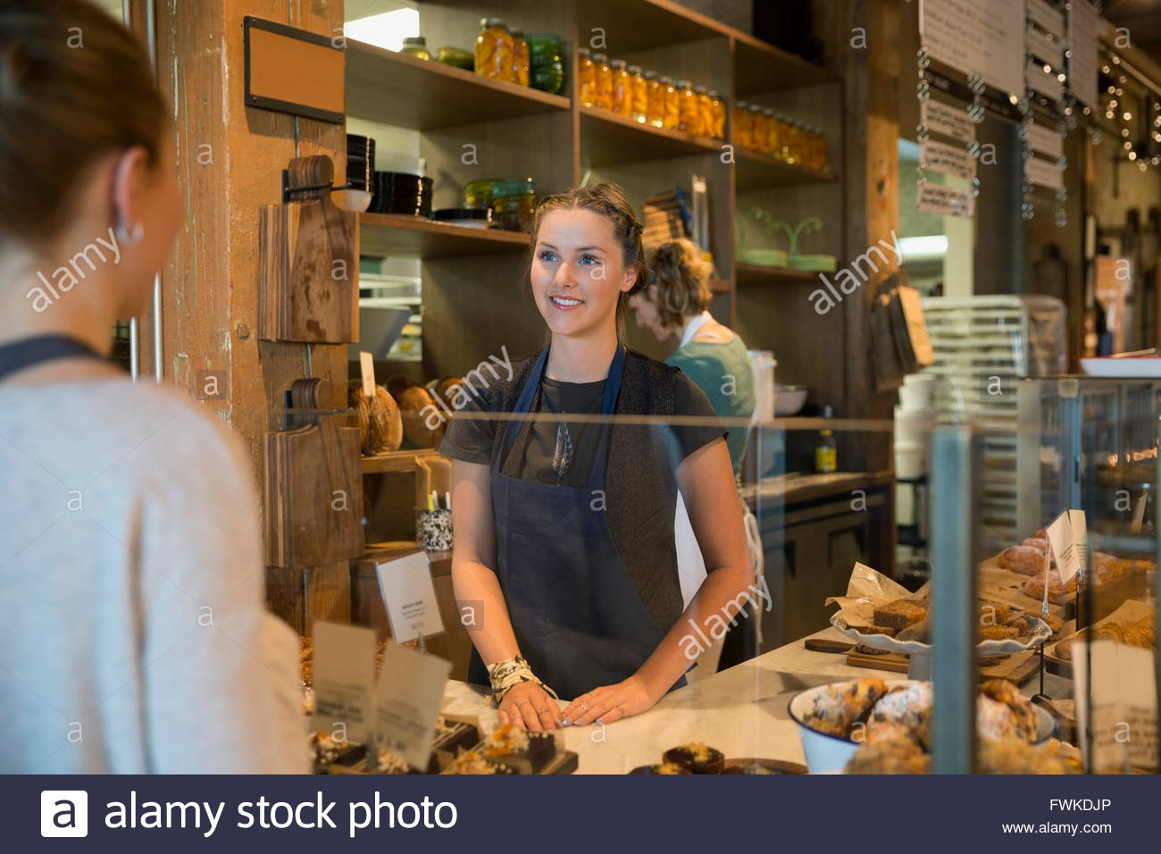Worker and customer bakery hi-res stock photography and images - Alamy