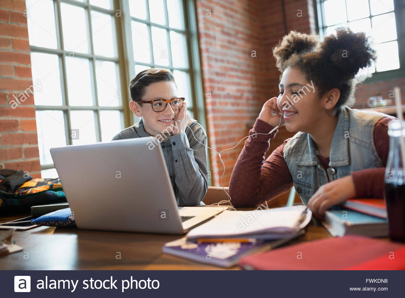 Technology girl boy laptop hi-res stock photography and images - Alamy