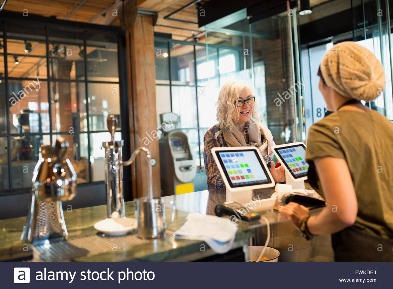 Woman ordering at coffee shop Stock Photo - Alamy