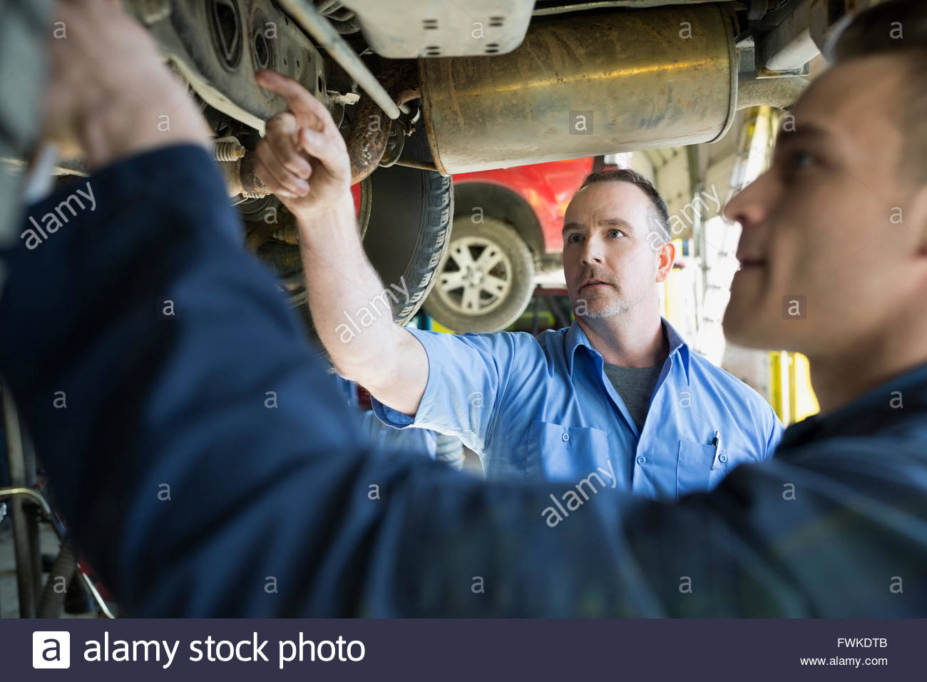 Father Son Car Repair Stock Photos & Father Son Car Repair Stock Images ...