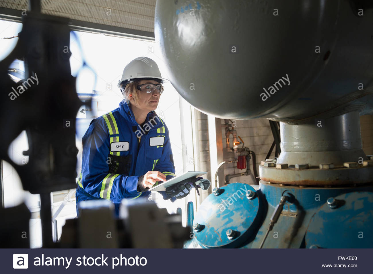 Female hard hat oil High Resolution Stock Photography and Images - Alamy