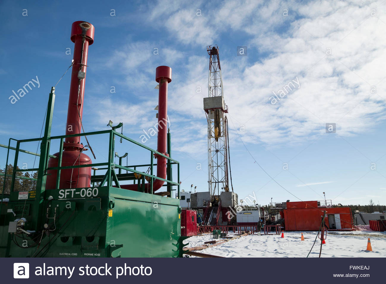 Drilling rig and equipment at gas plant Stock Photo - Alamy