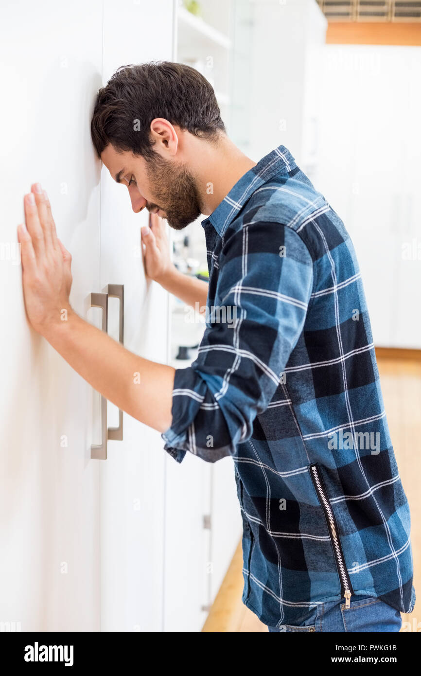 Man leaning against door hi-res stock photography and images - Alamy