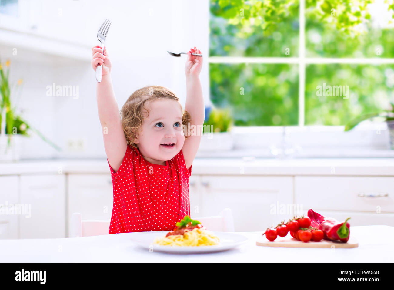 Kids eat pasta. Healthy lunch for children. Toddler kid eating ...