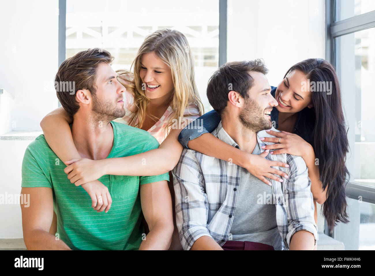 Young happy couple talking hugging hi-res stock photography and images ...