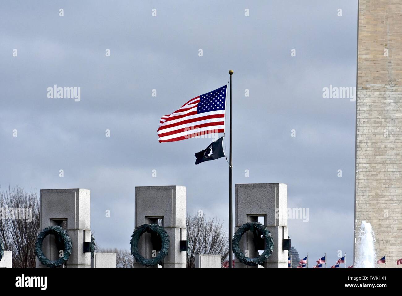 USA flags around the Washington monument in DC Stock Photo - Alamy
