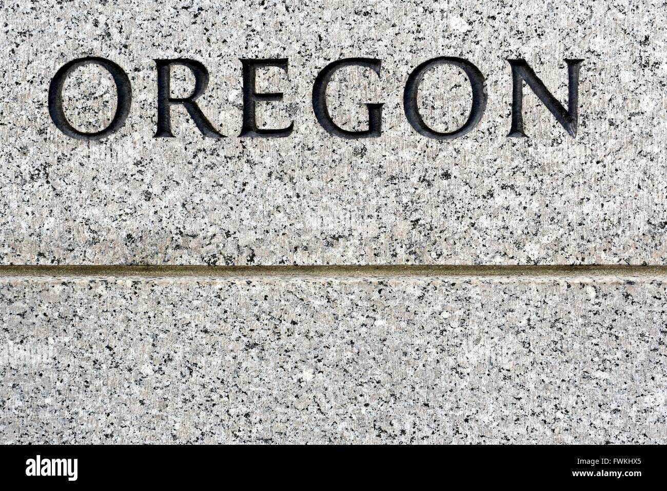 The state of Oregon carved into a stone wall at the World War ii ...