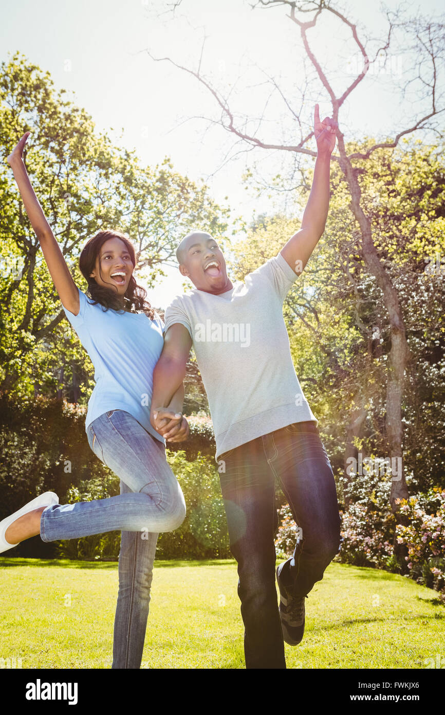 Young couple having fun and dancing Stock Photo - Alamy