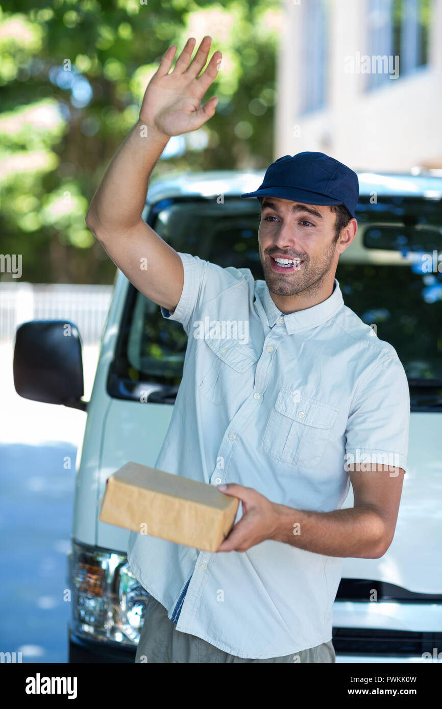 Waving standing smiling looking away hi-res stock photography and ...