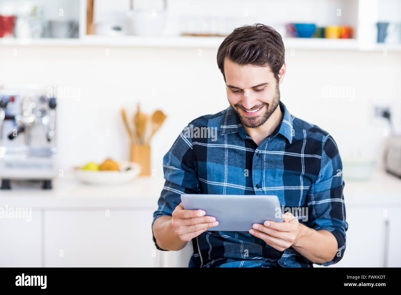 Man using digital tablet Stock Photo - Alamy