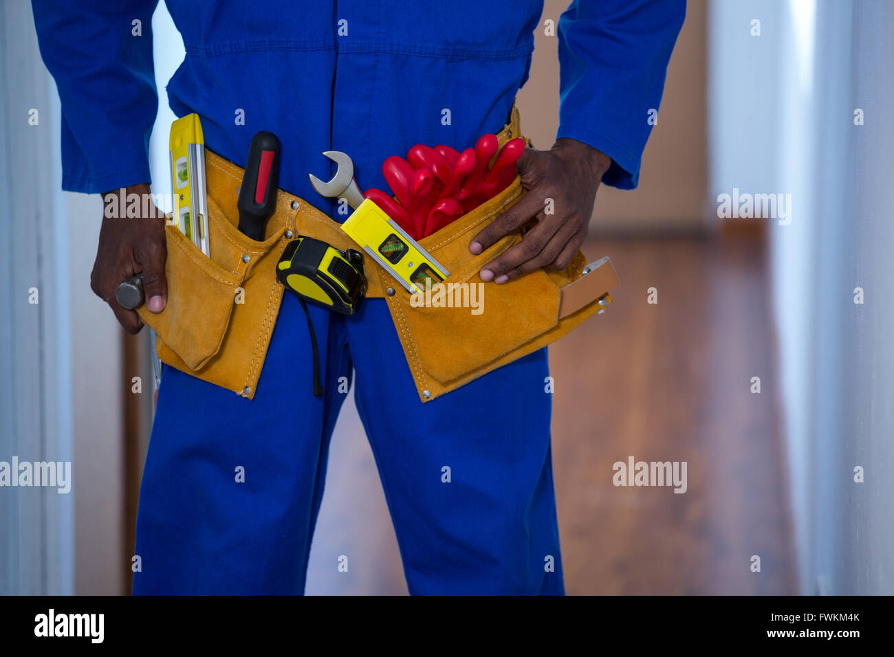 Man wearing tool belt hi-res stock photography and images - Alamy