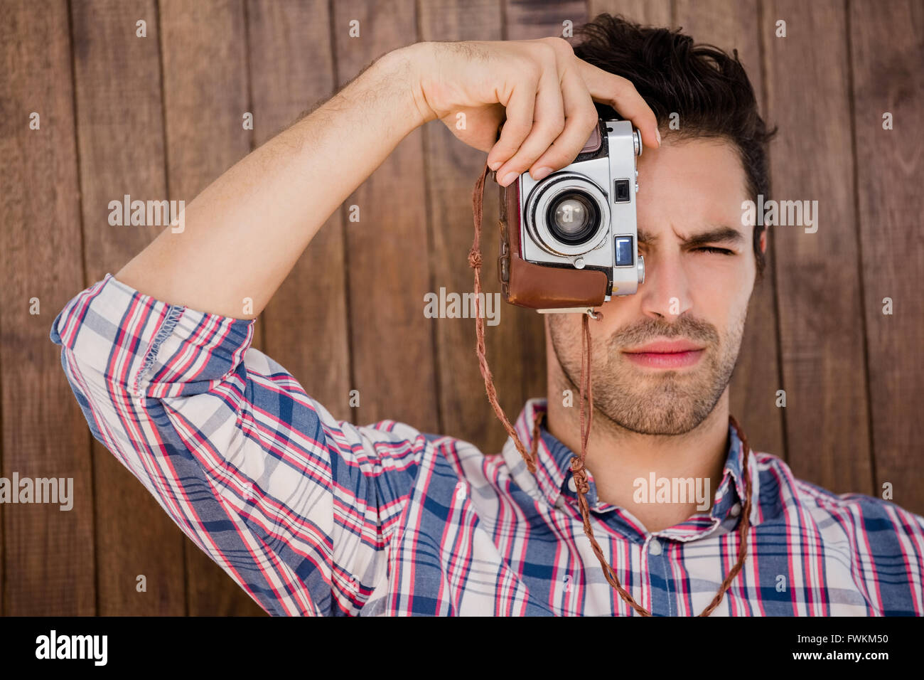 Man photographing with camera Stock Photo - Alamy