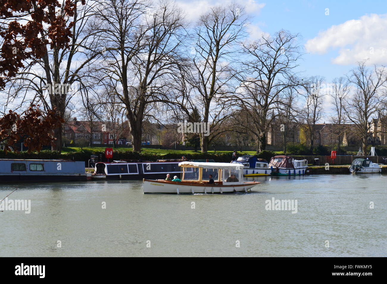 A pleasure boat on the Isis (River Thames) in Oxford UK one sunny ...